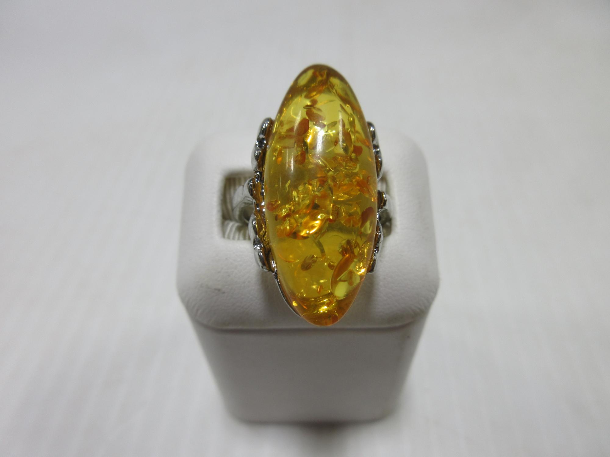 Albrecht Auctions | Amber Ring with Stainless Steel Band, Size 8