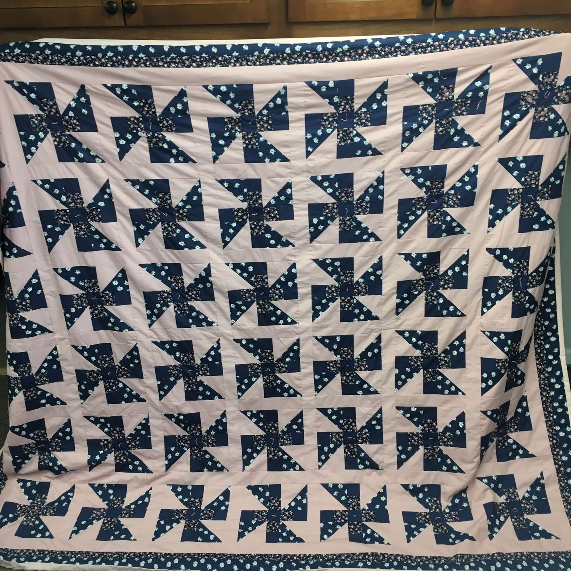 Albrecht Auctions | Handcrafted Patchwork Quilt, Windmill Pattern, Tied