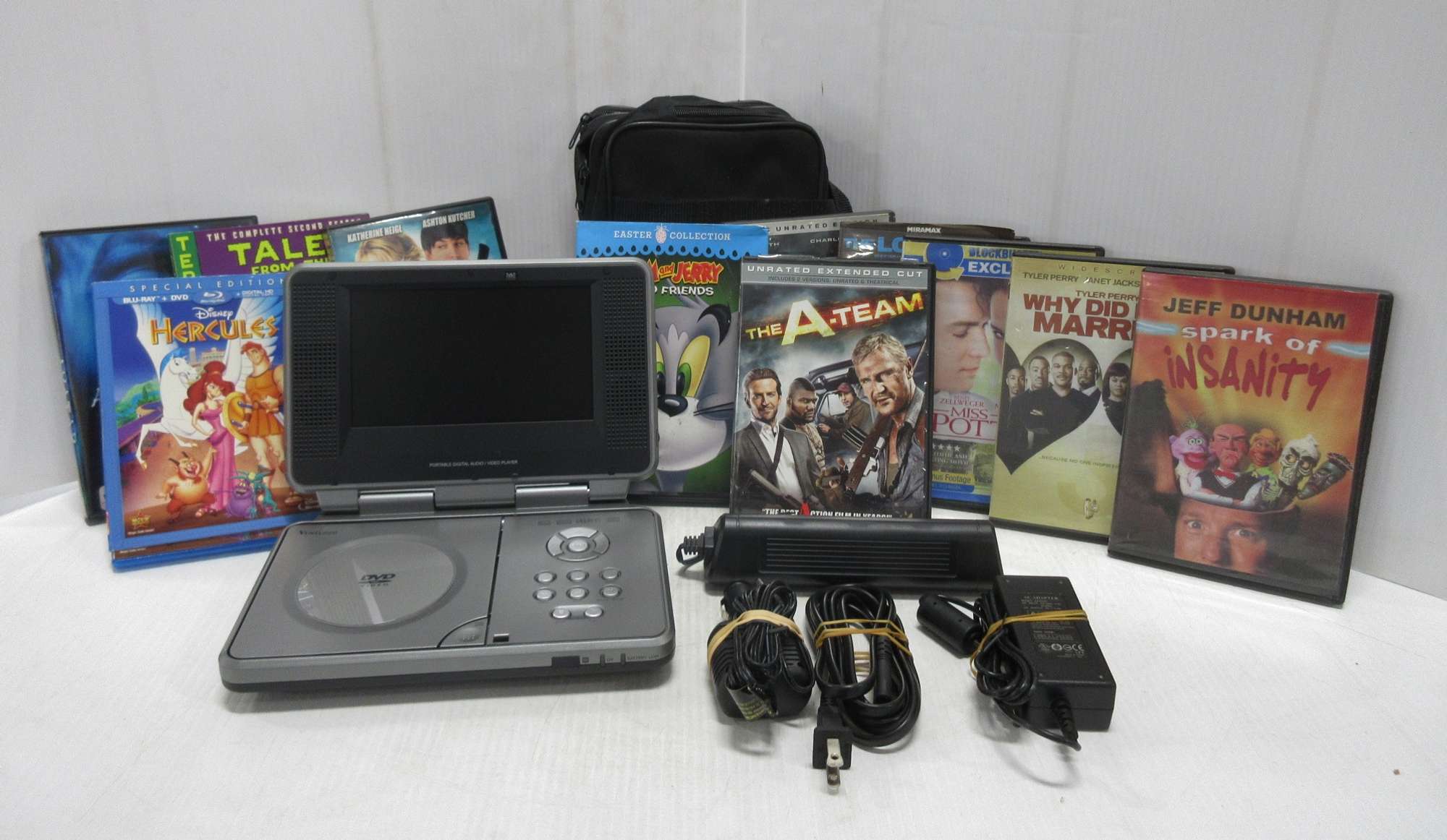 Albrecht Auctions | (10) DVDs and Small Portable DVD Player
