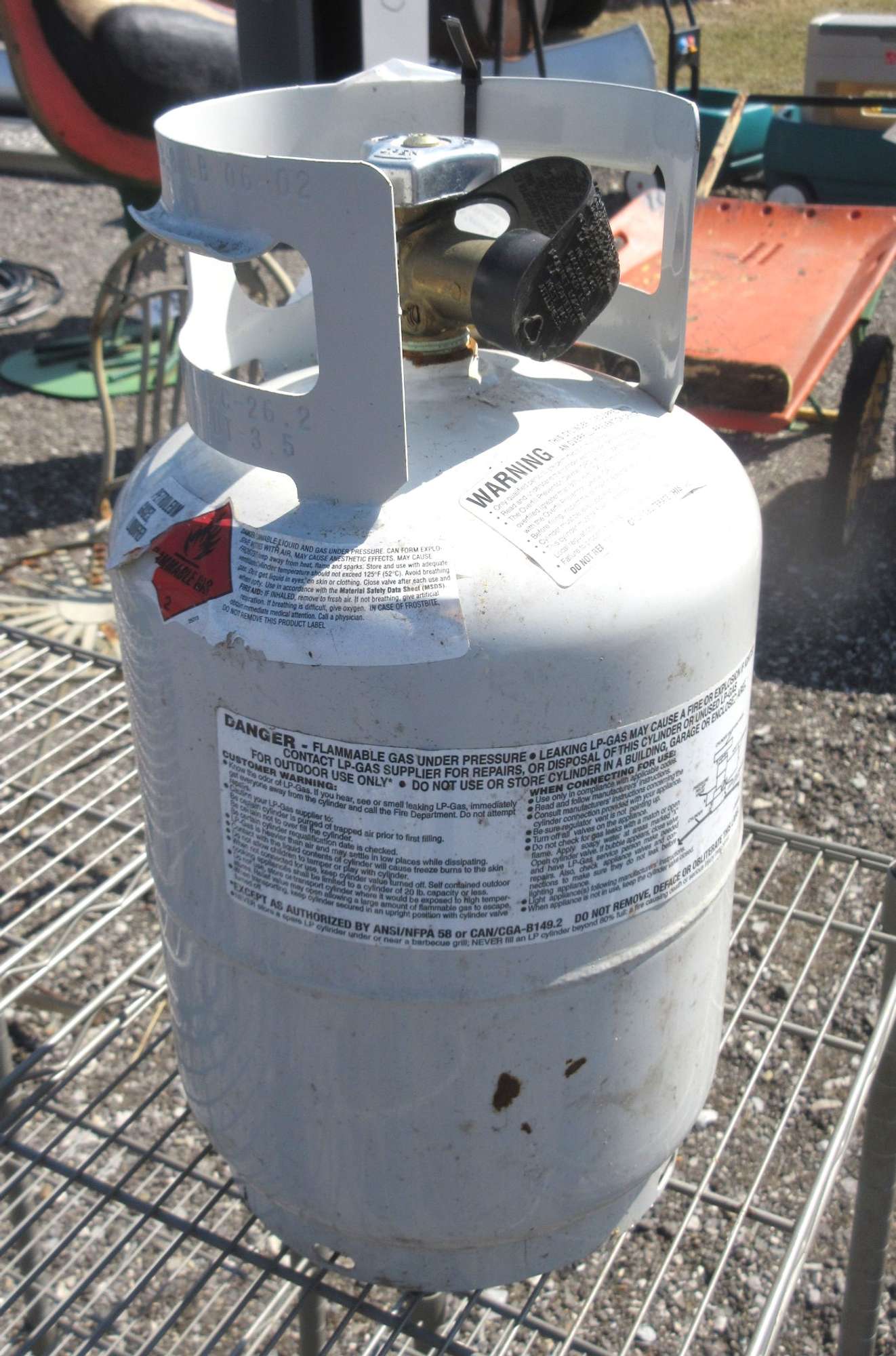 Albrecht Auctions | 11 lb. Propane Tank with OPD Valve, Mfg. Date 06-02
