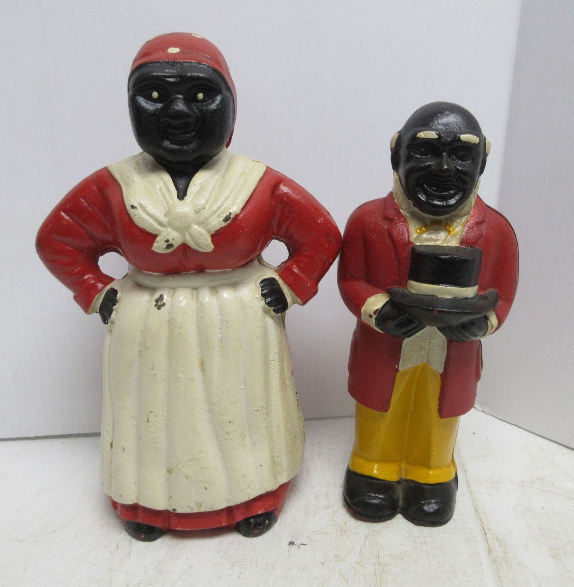 Albrecht Auctions | Black Americana Cast Iron Banks: Mammy and Uncle Sam
