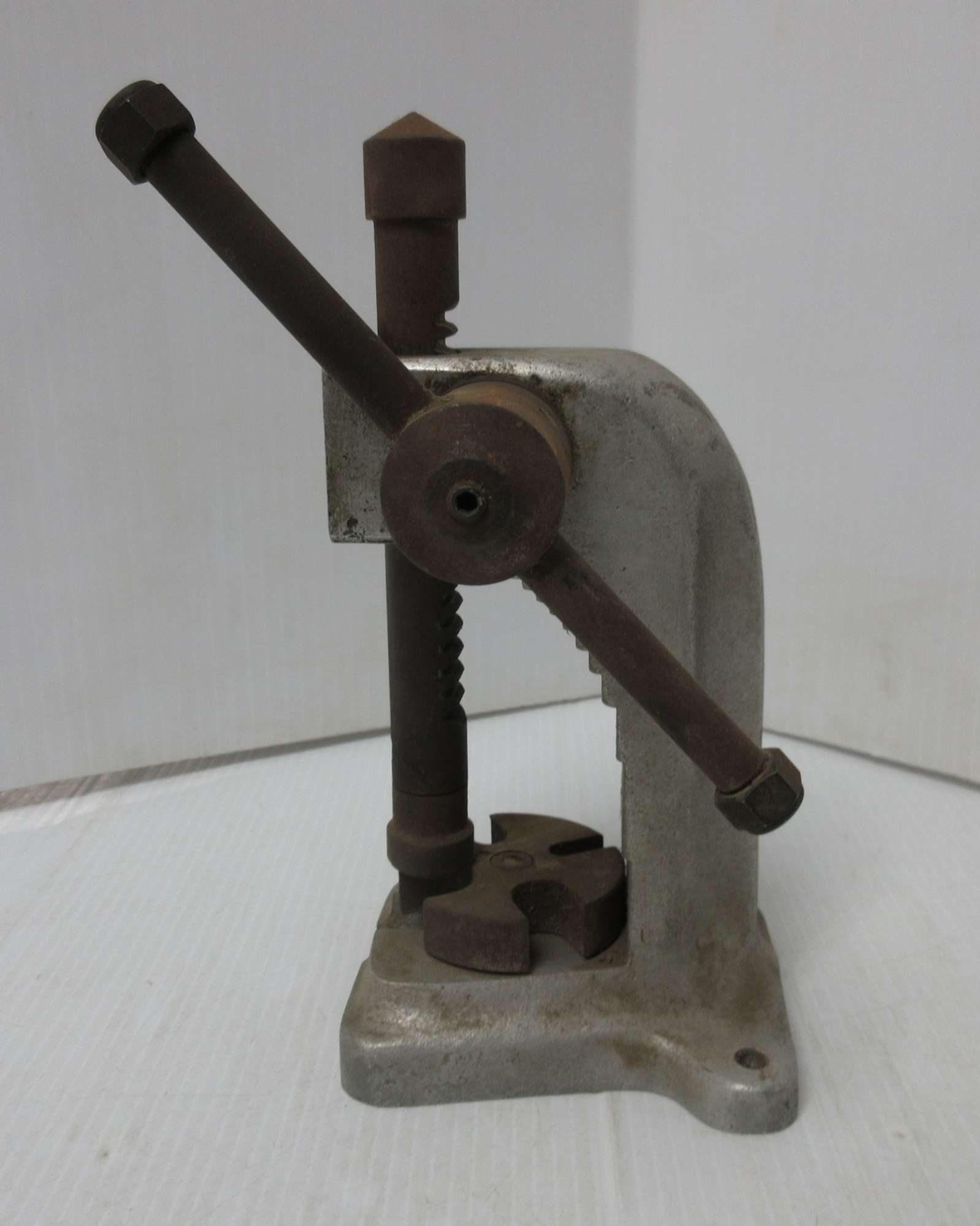 Albrecht Auctions | DGD Tabletop Hand Press/Punch, Four Sizes on Platform