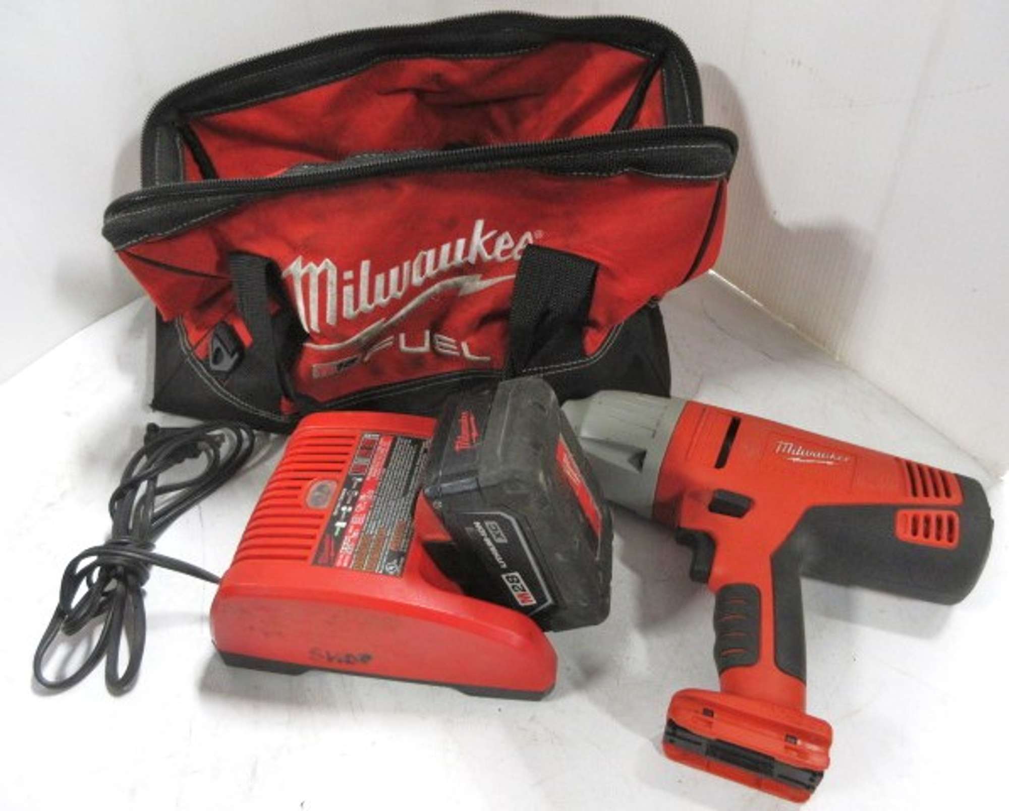 Albrecht Auctions | Milwaukee 28V Impact Wrench and Charger
