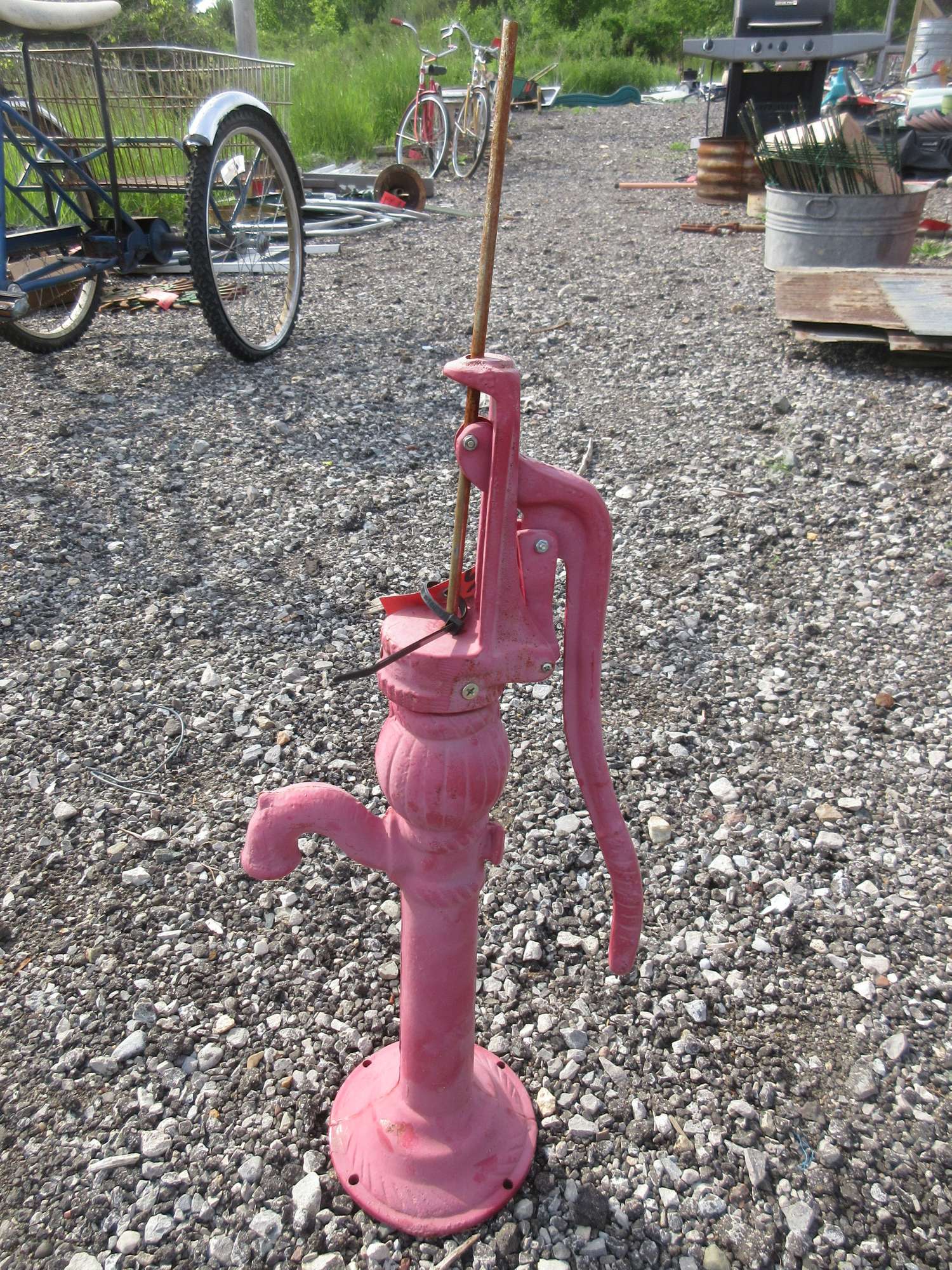 Albrecht Auctions | Small Hand Pump, Red in Color
