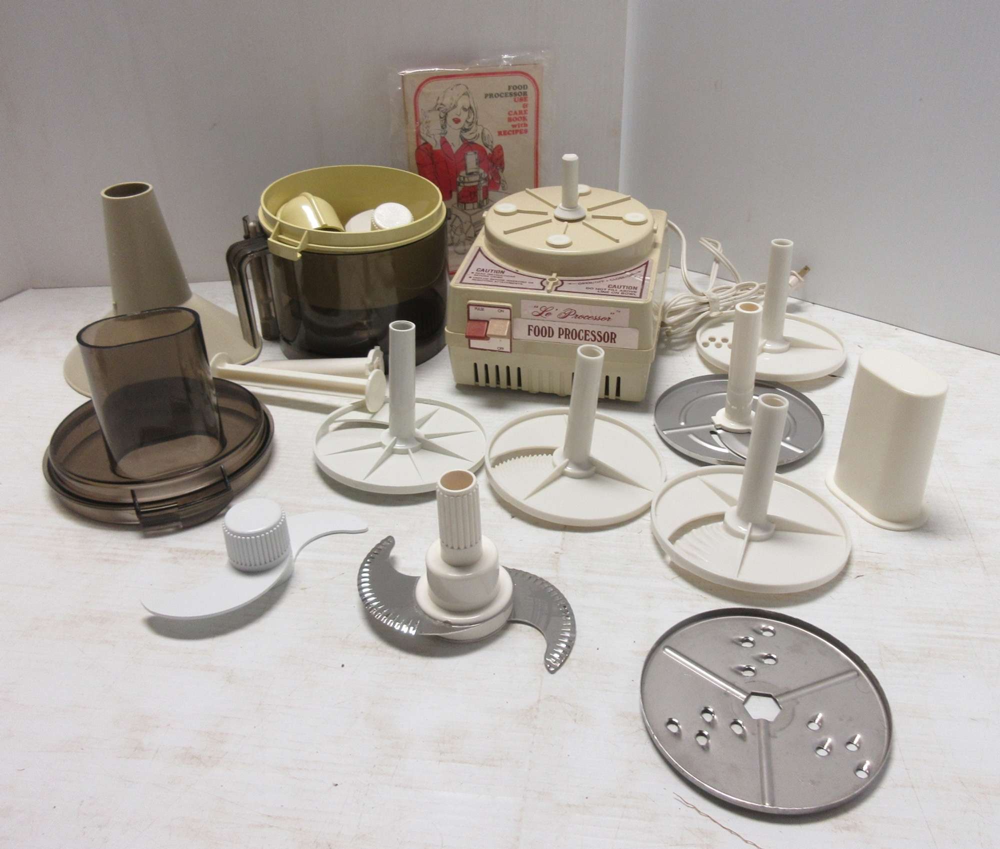 Albrecht Auctions | Smaller Food Processor with Manual and Recipes