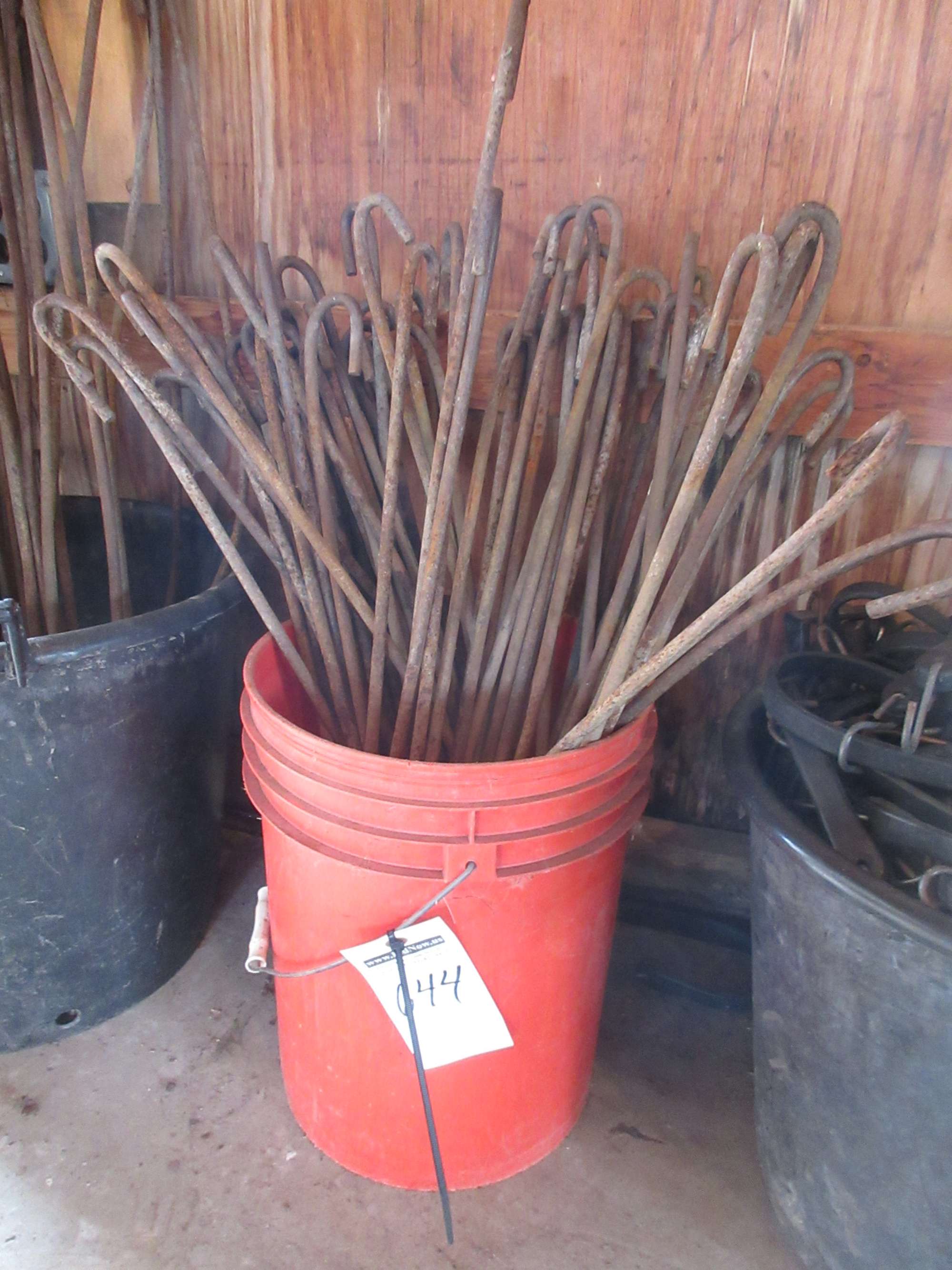 Albrecht Auctions | Bucket of Approx. 28"L Iron Stakes