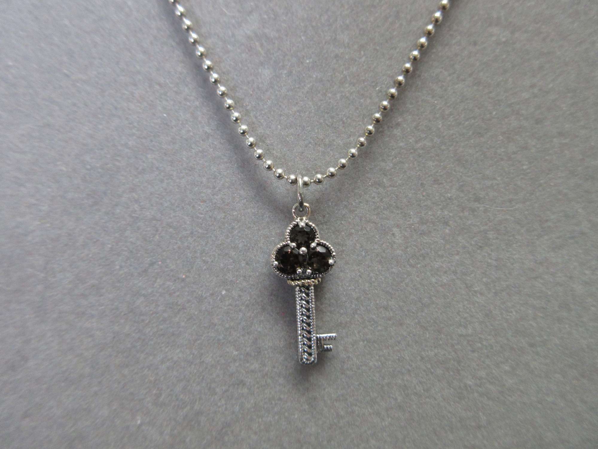 Albrecht Auctions | 14K and .925 Key Pendant with Genuine Purple ...