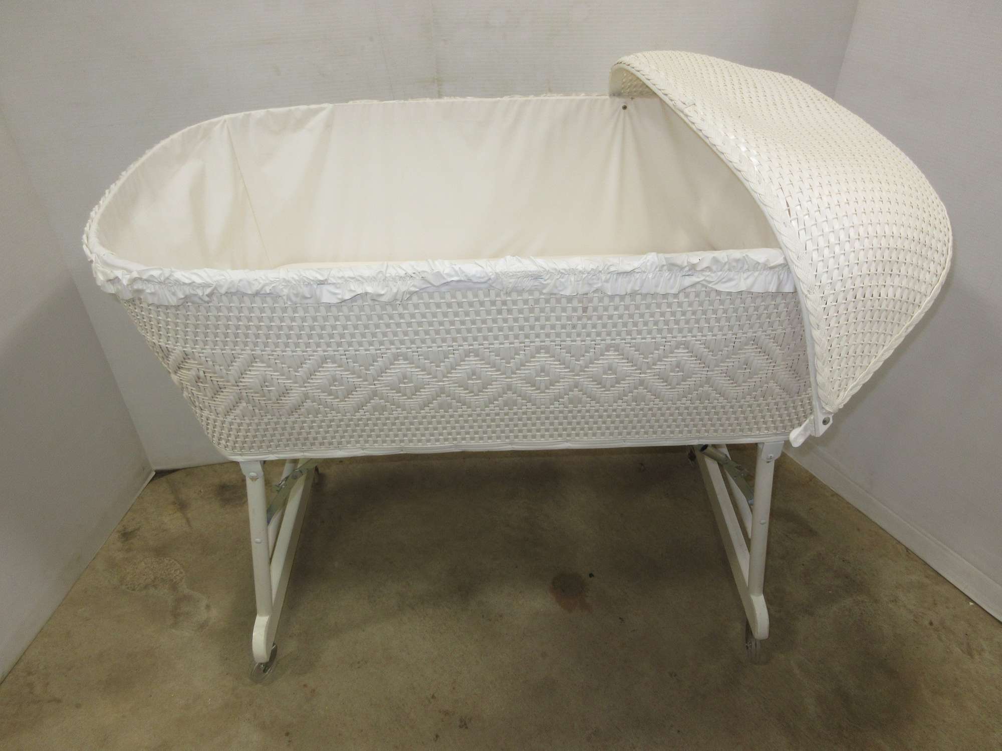 Albrecht Auctions | Hooded White Wicker Baby Bassinet on Legs with Pad