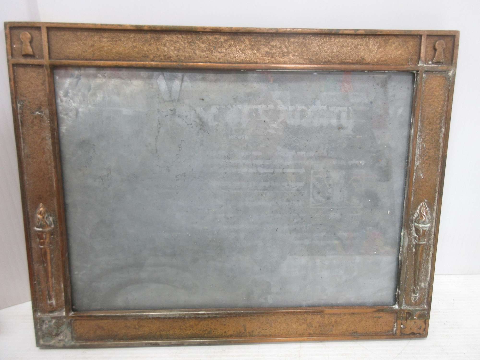 Albrecht Auctions | Very Heavy Brass Frame, Torch Design on Each Side