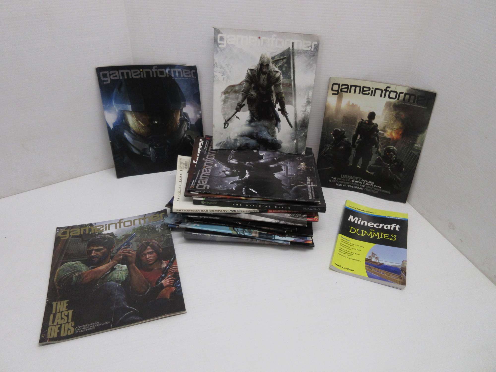 Albrecht Auctions | (18) Game Informer Magazines and (3) Game Books