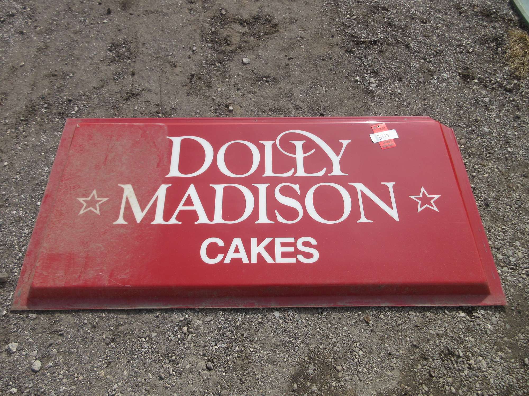 Albrecht Auctions | Plastic "Dolly Madison Cakes" Sign