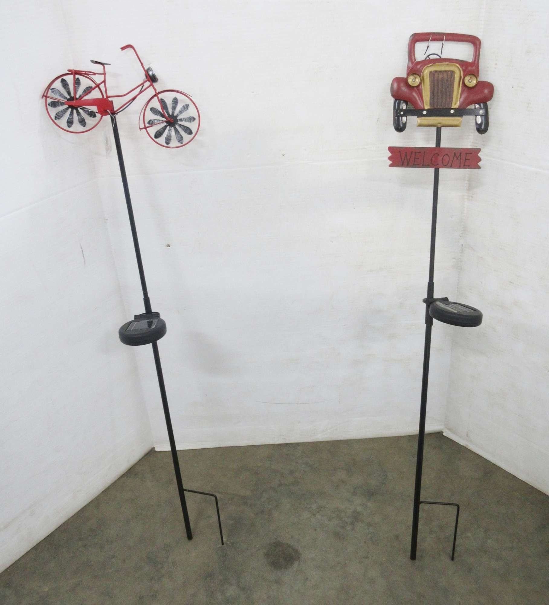 Albrecht Auctions | Solar Metal Bike and Red Truck Yard Stakes