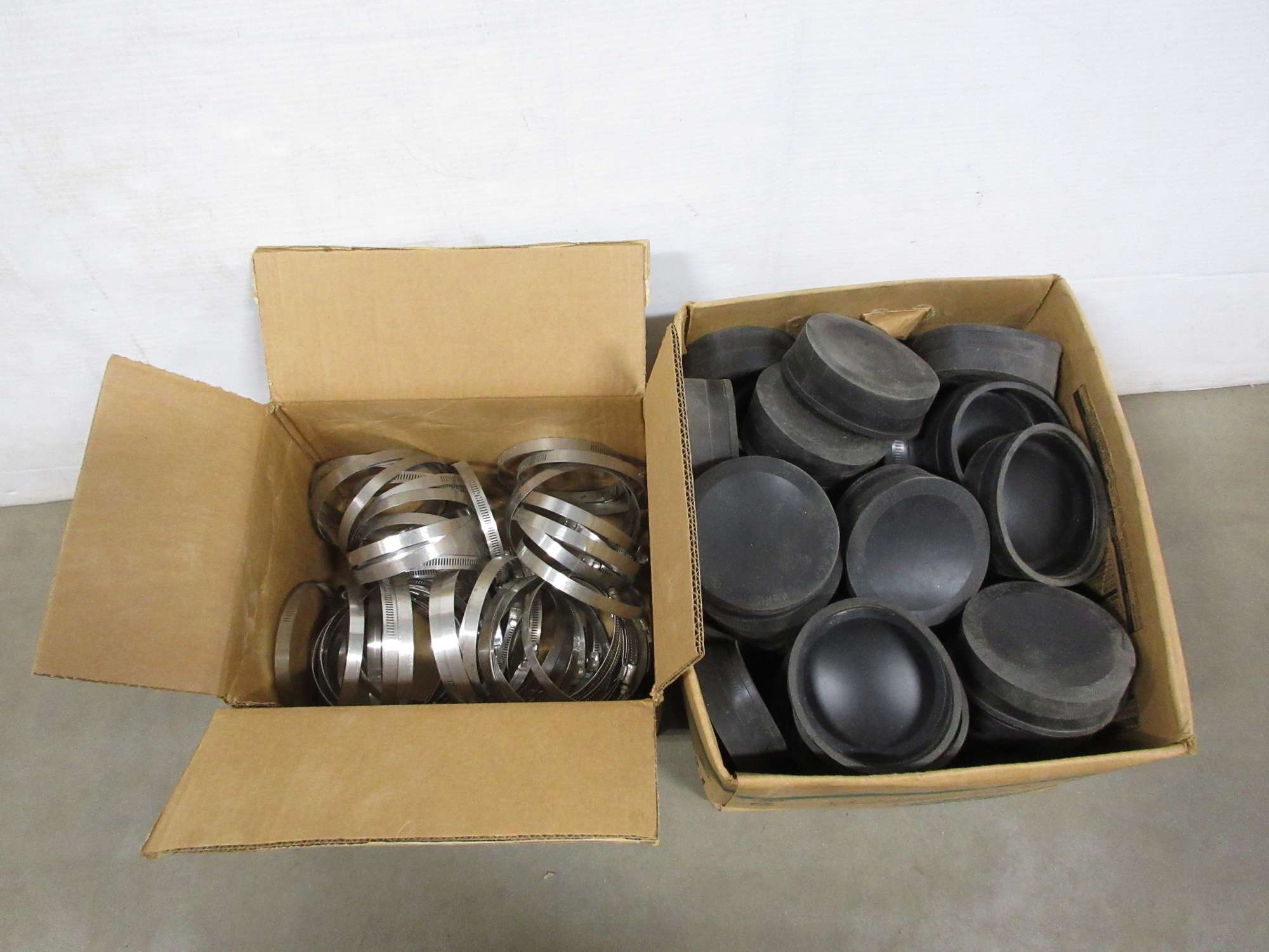 Albrecht Auctions | 4" Rubber Caps and Box of Clamps