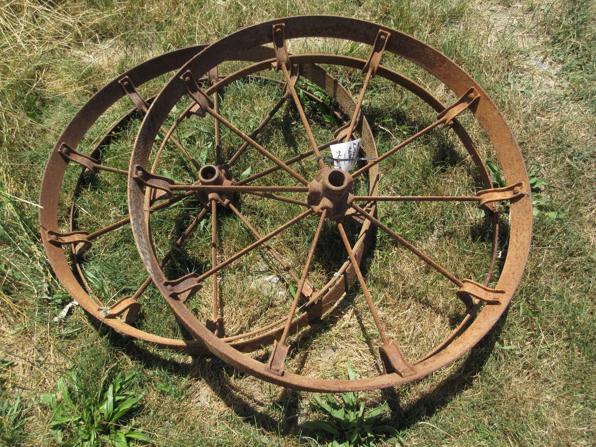 Albrecht Auctions | (2) Cast Iron Wheels