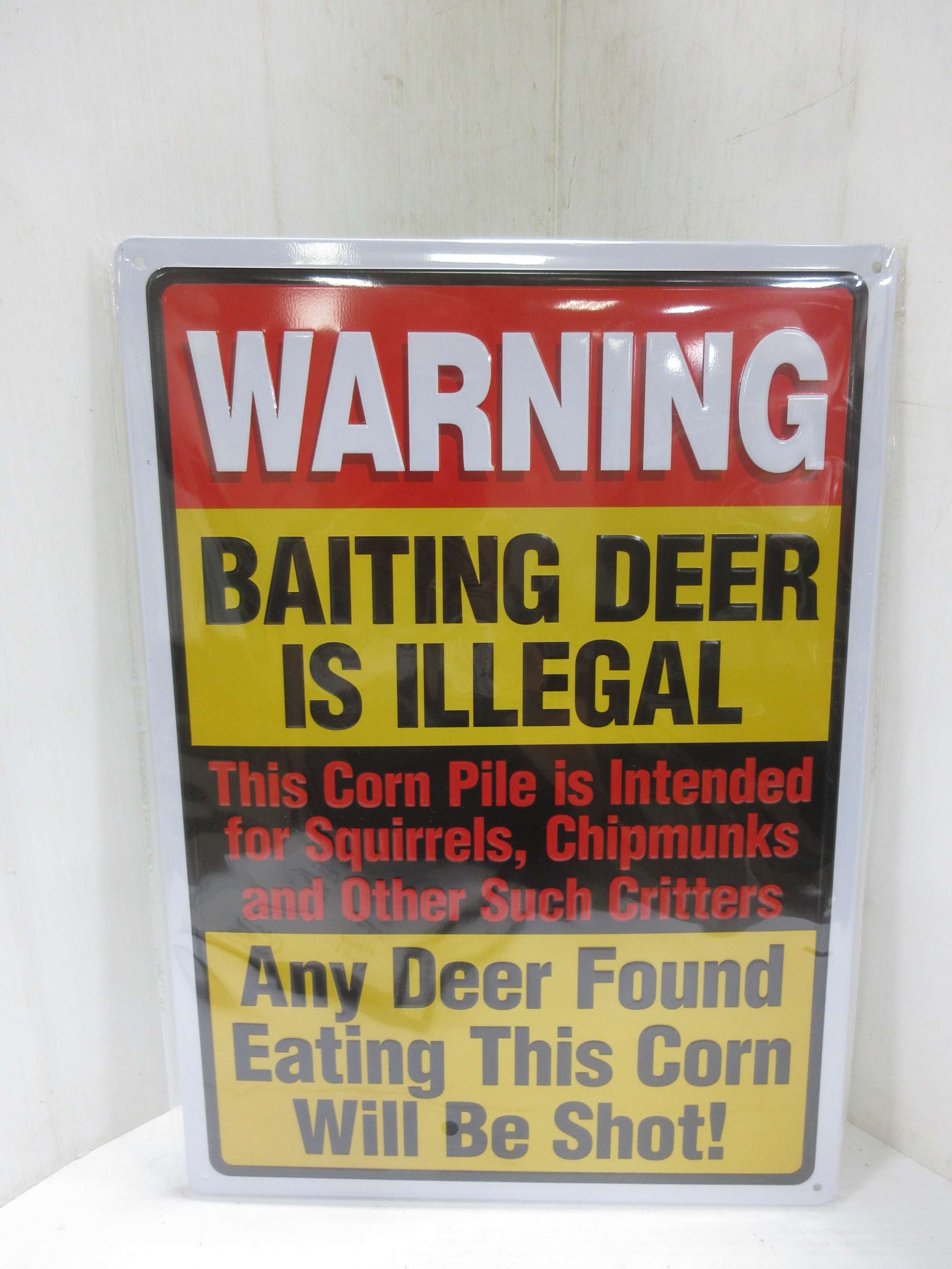 Albrecht Auctions | Warning: Baiting Deer is Illegal Tin Sign