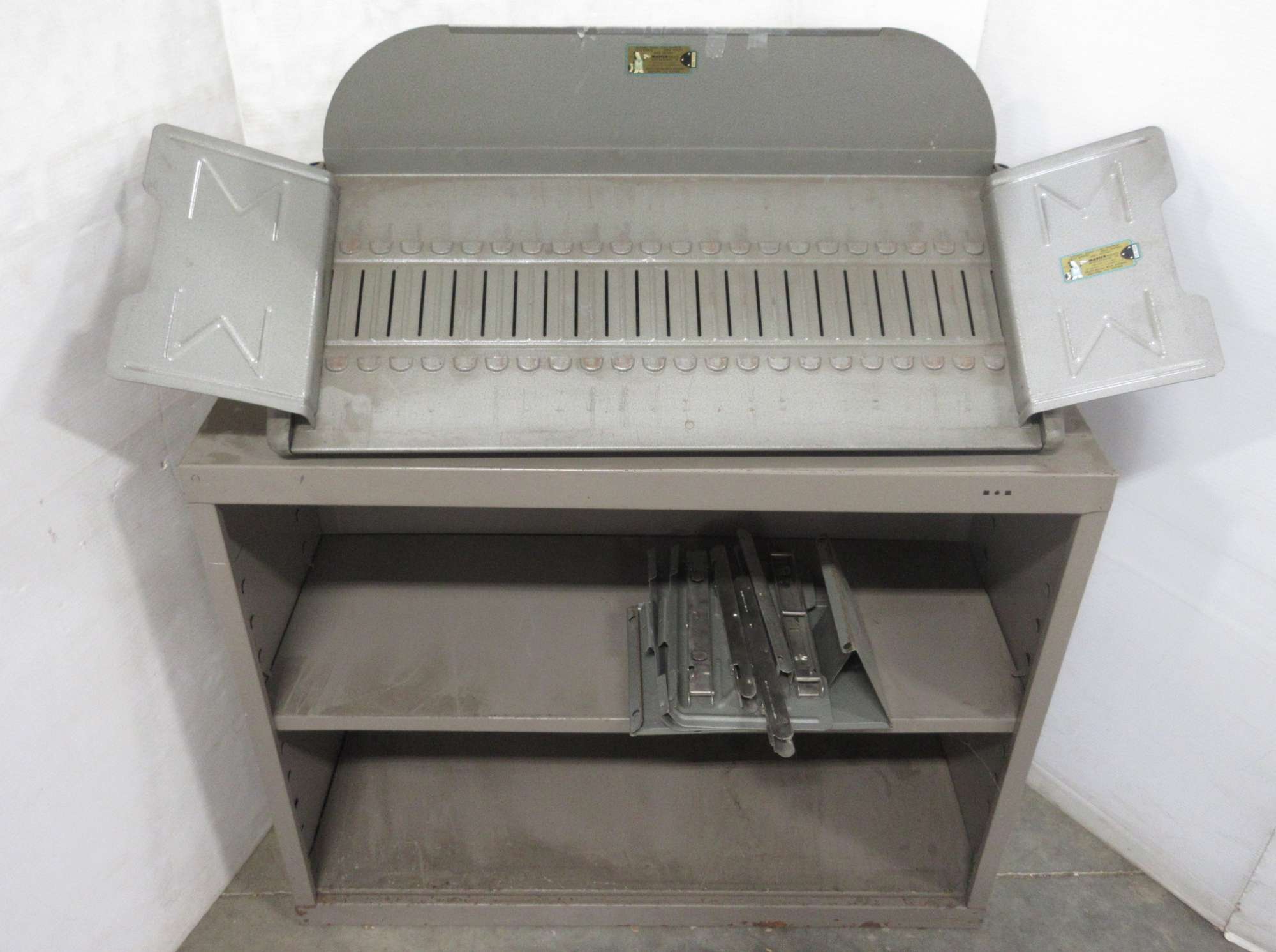 Albrecht Auctions | Master products magazine display case in metal, 38 ...