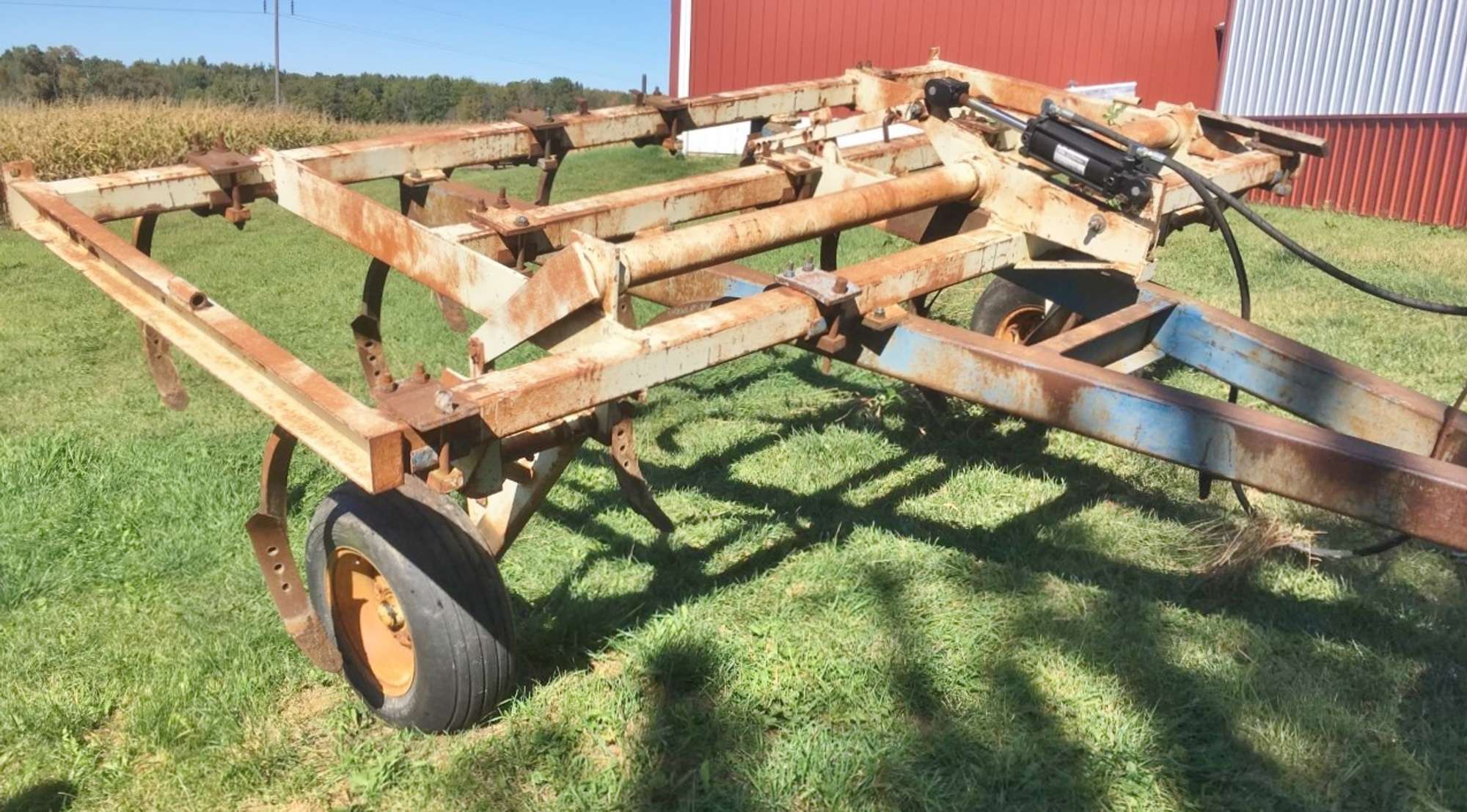 Albrecht Auctions | DMI 11-Shank Chisel Plow, Sells with a Spare Shank
